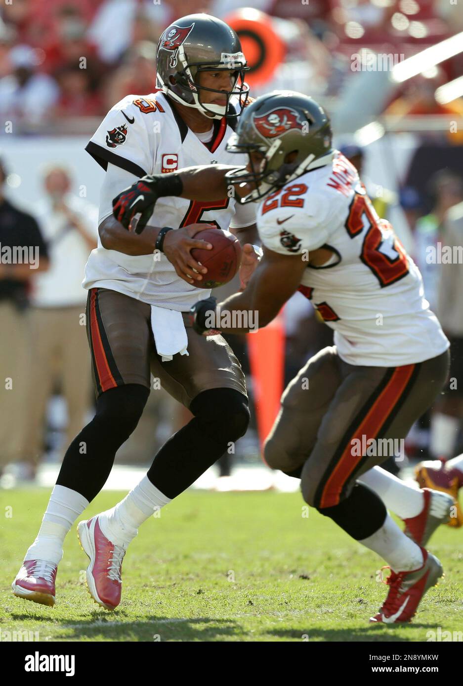 Tampa Bay Buccaneers quarterback Josh Freeman (5) fakes a handoff to ...
