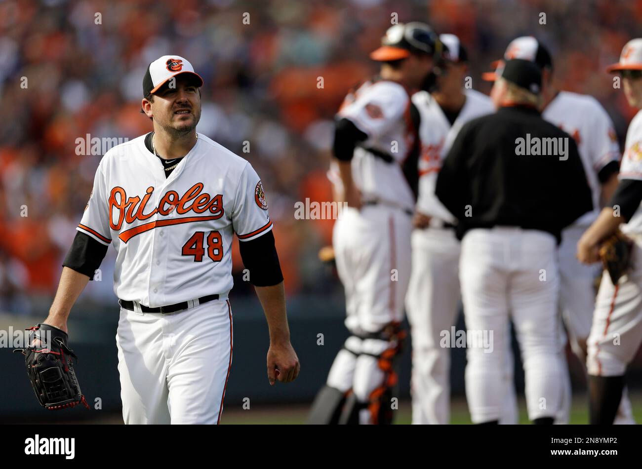 Baltimore Orioles starting pitcher Joe Saunders walks off the field ...