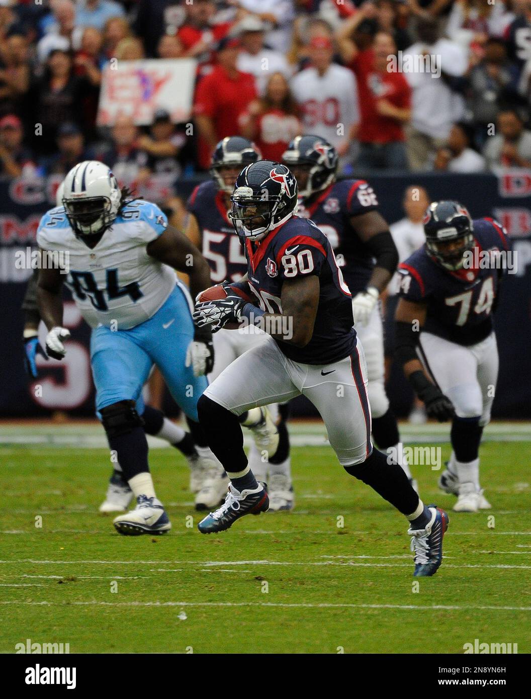 Houston Texans Andre Johnson (80) runs for a first down after a catch ...