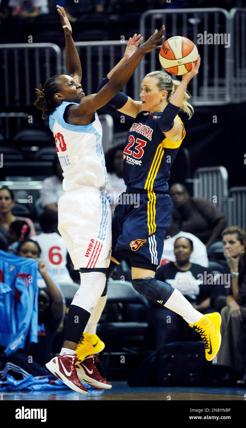 Indiana Fever guard Katie Douglas (23) is defended by Atlanta Dream ...