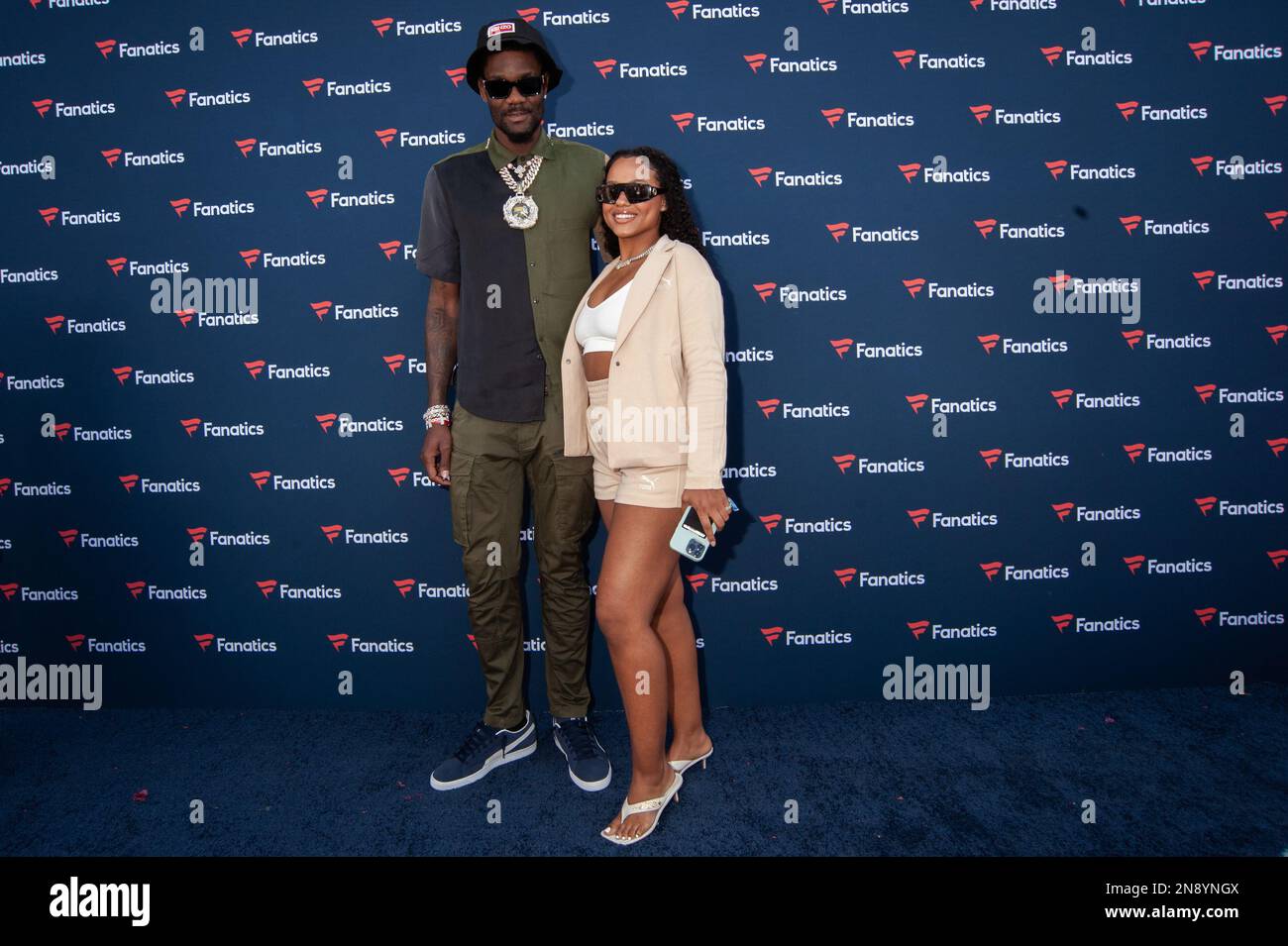 Phoenix, USA. 11th Feb, 2023. Deandre Ayton and Anissa Evans walking on ...