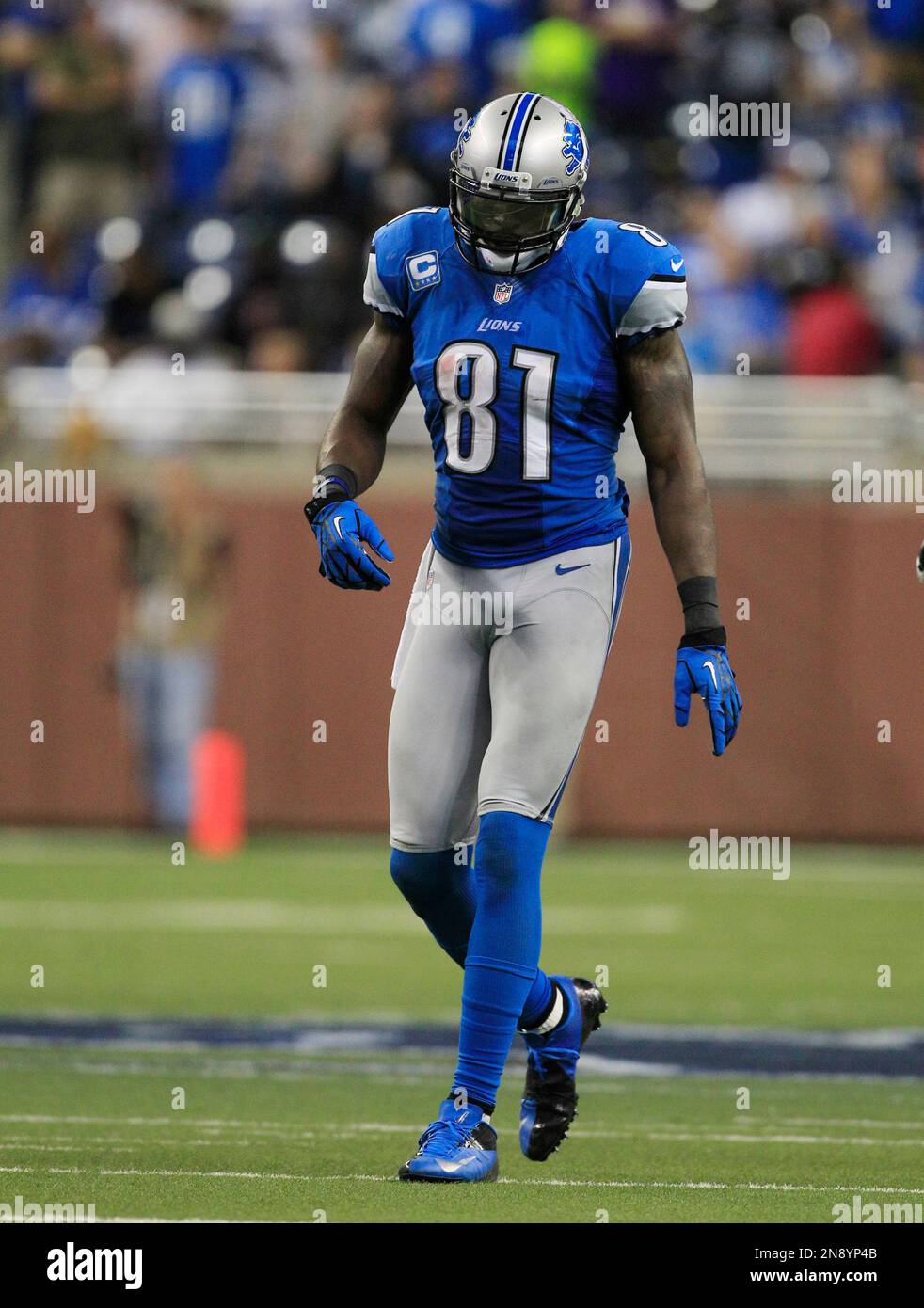 Detroit Lions wide receiver Calvin Johnson (81) walks back to the ...