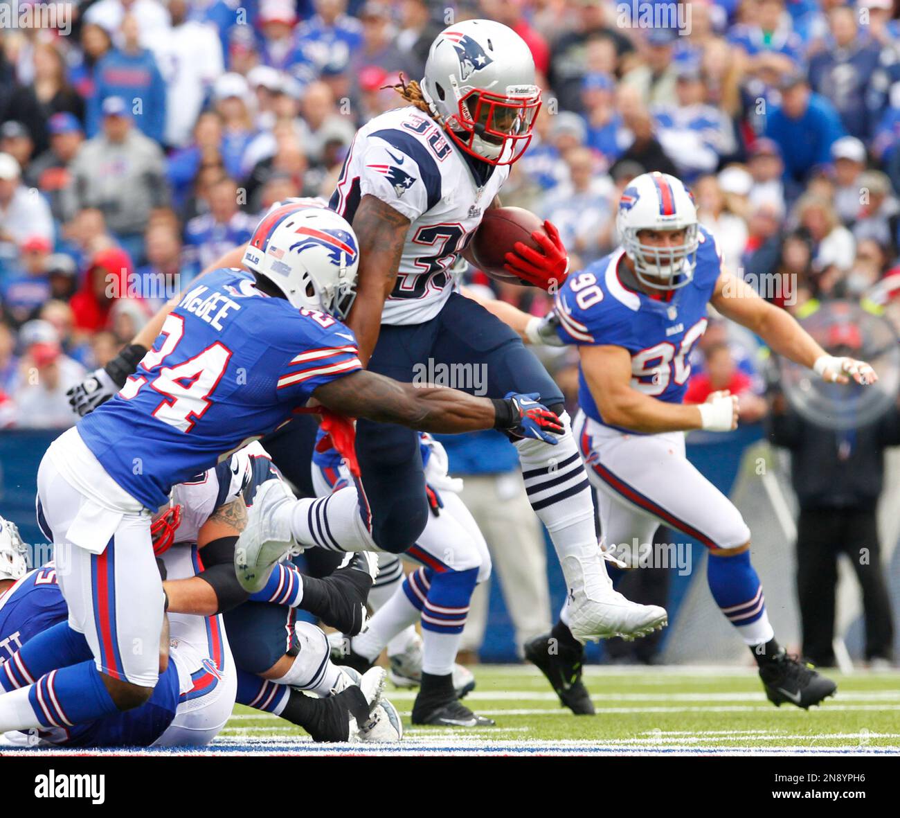 New England Patriots' Brandon Bolden (38) tries to run through the ...