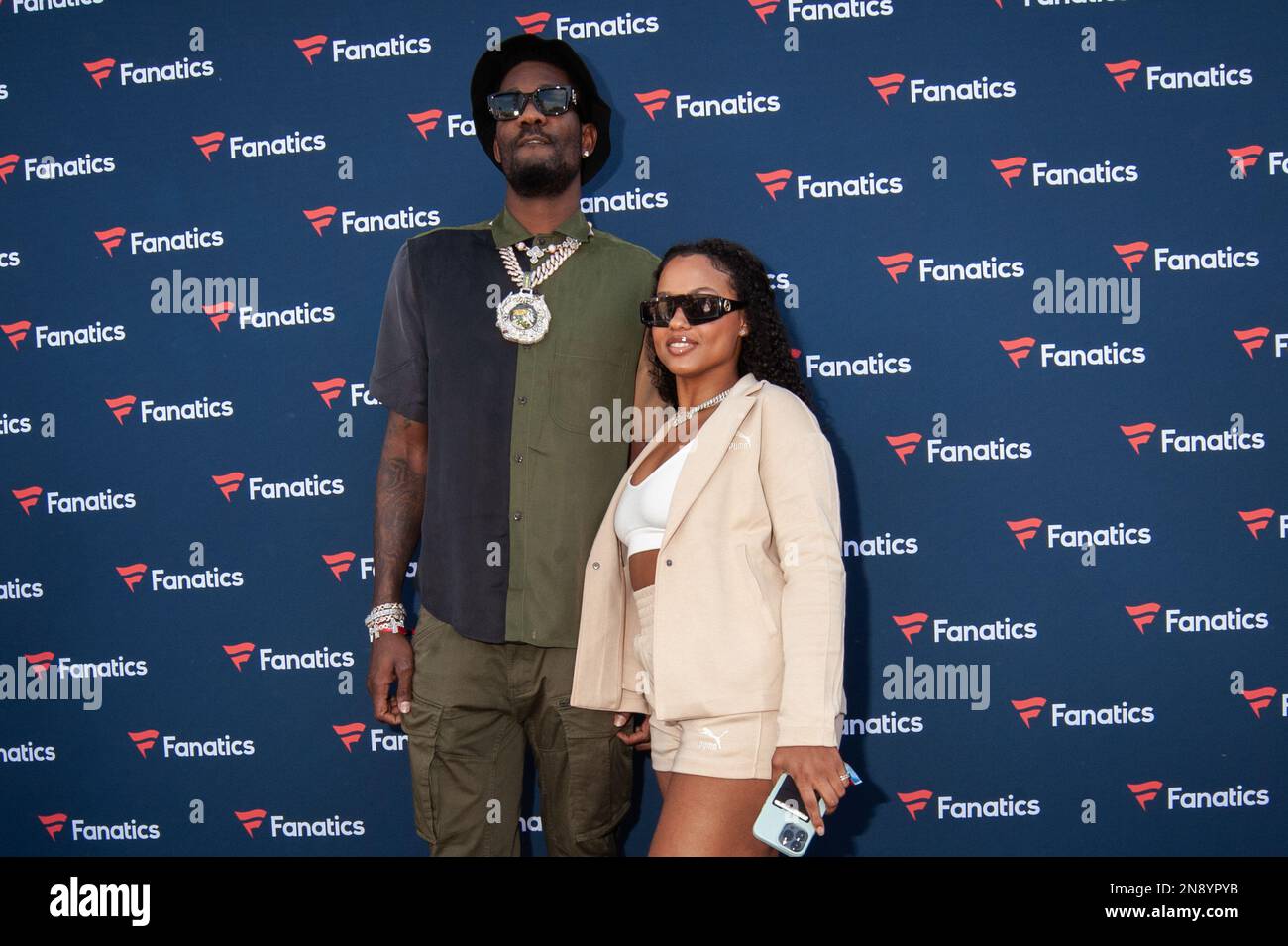 Phoenix, USA. 11th Feb, 2023. Deandre Ayton and Anissa Evans walking on ...