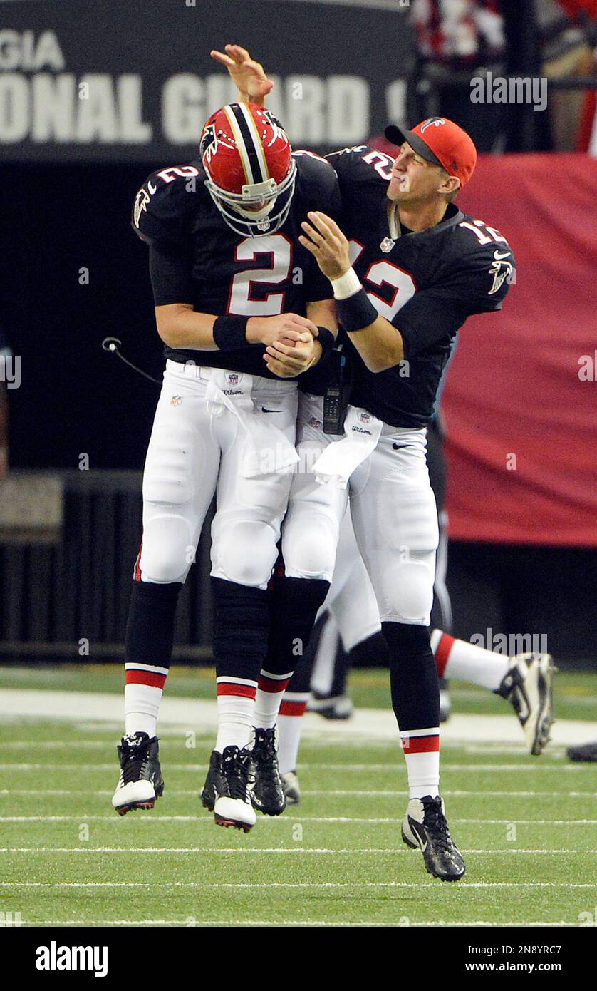 Atlanta Falcons quarterback Matt Ryan (2) reacts with quarterback Luke ...