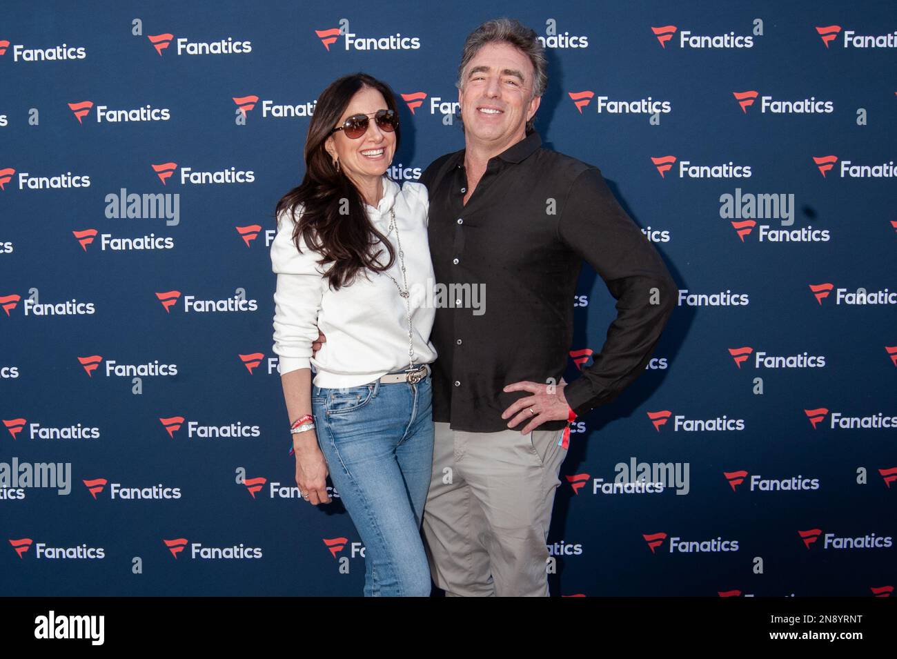Emilia Fazzalari and Wyc Grousbeck walking on the red carpet at Michael ...