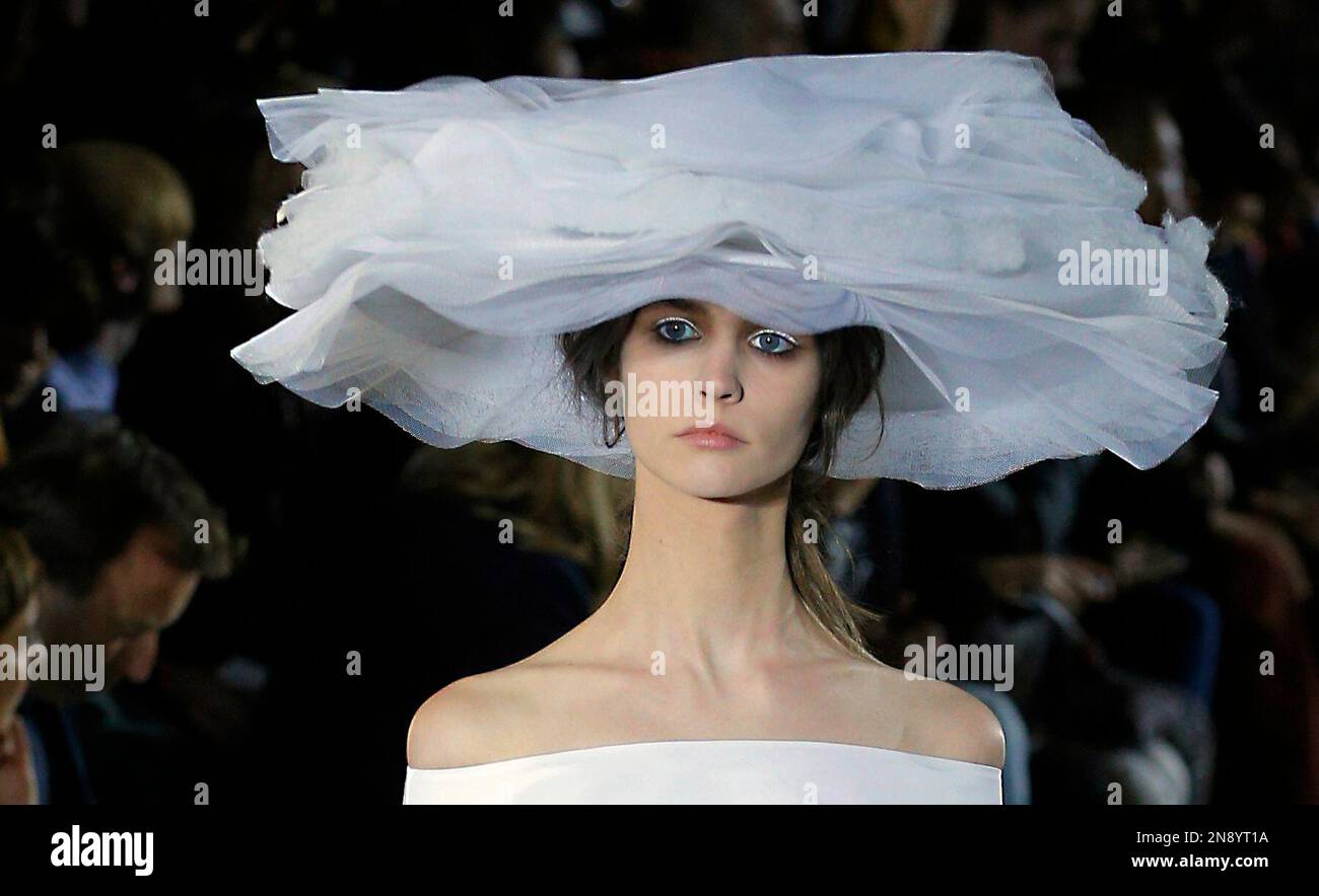 A model wears a creation by fashion designer Bill Gaytten for John ...