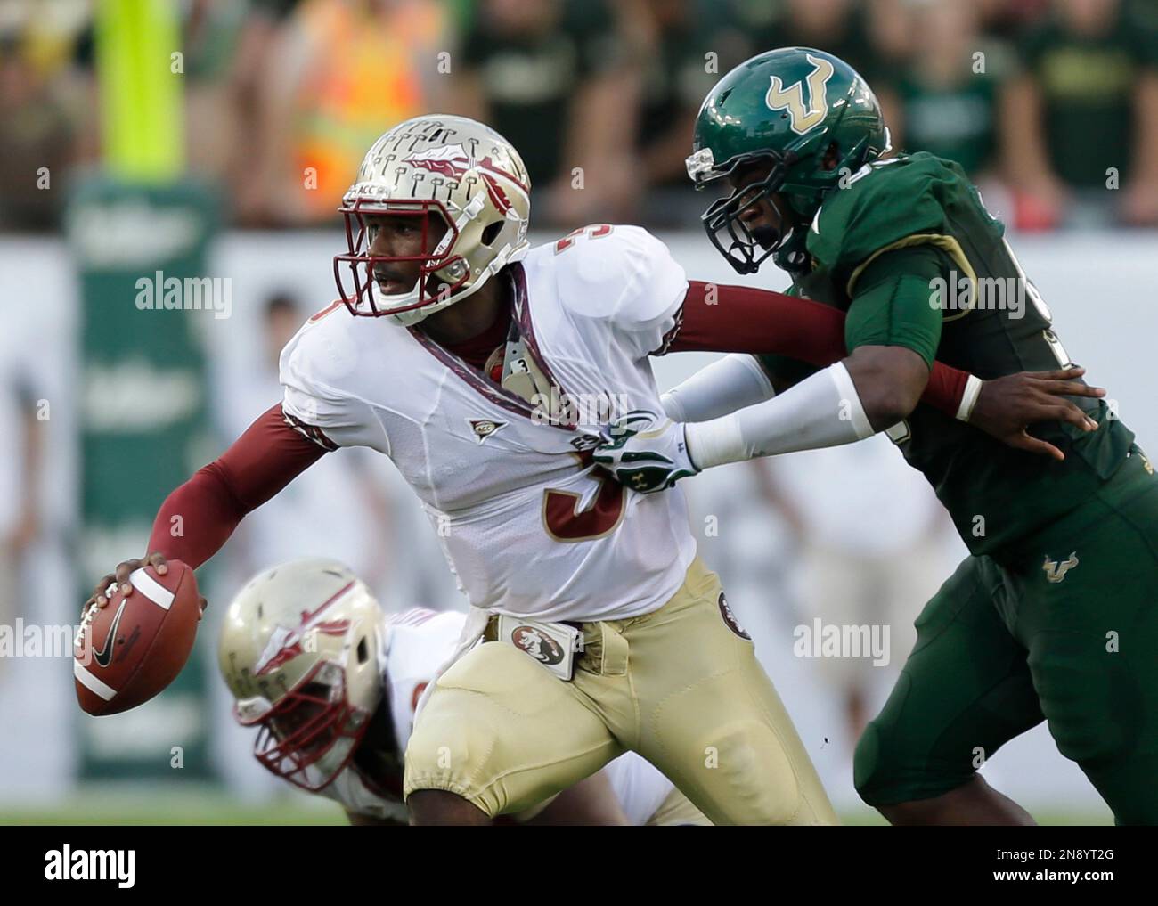 Florida State quarterback EJ Manuel (3) eludes South Florida defensive ...