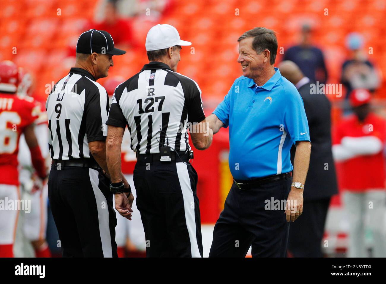 San Diego Chargers coach Norv Turner shakes hands with referee Bill ...