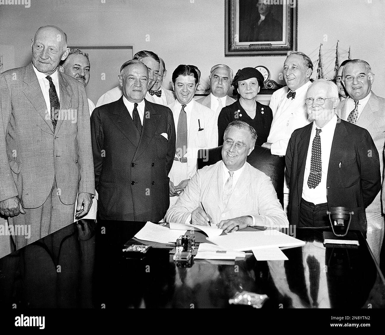 FLE - In this Aug. 14, 1935, file photo President Franklin Roosevelt ...