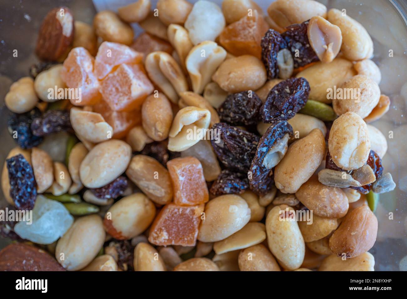 Trail mix in a container at home for hikes Stock Photo - Alamy