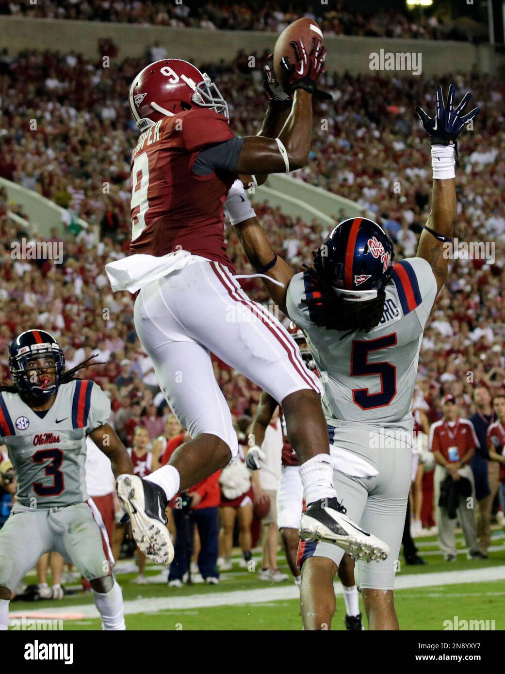 Alabama wide receiver Amari Cooper (9) catches a 12-yard touchdown pass ...