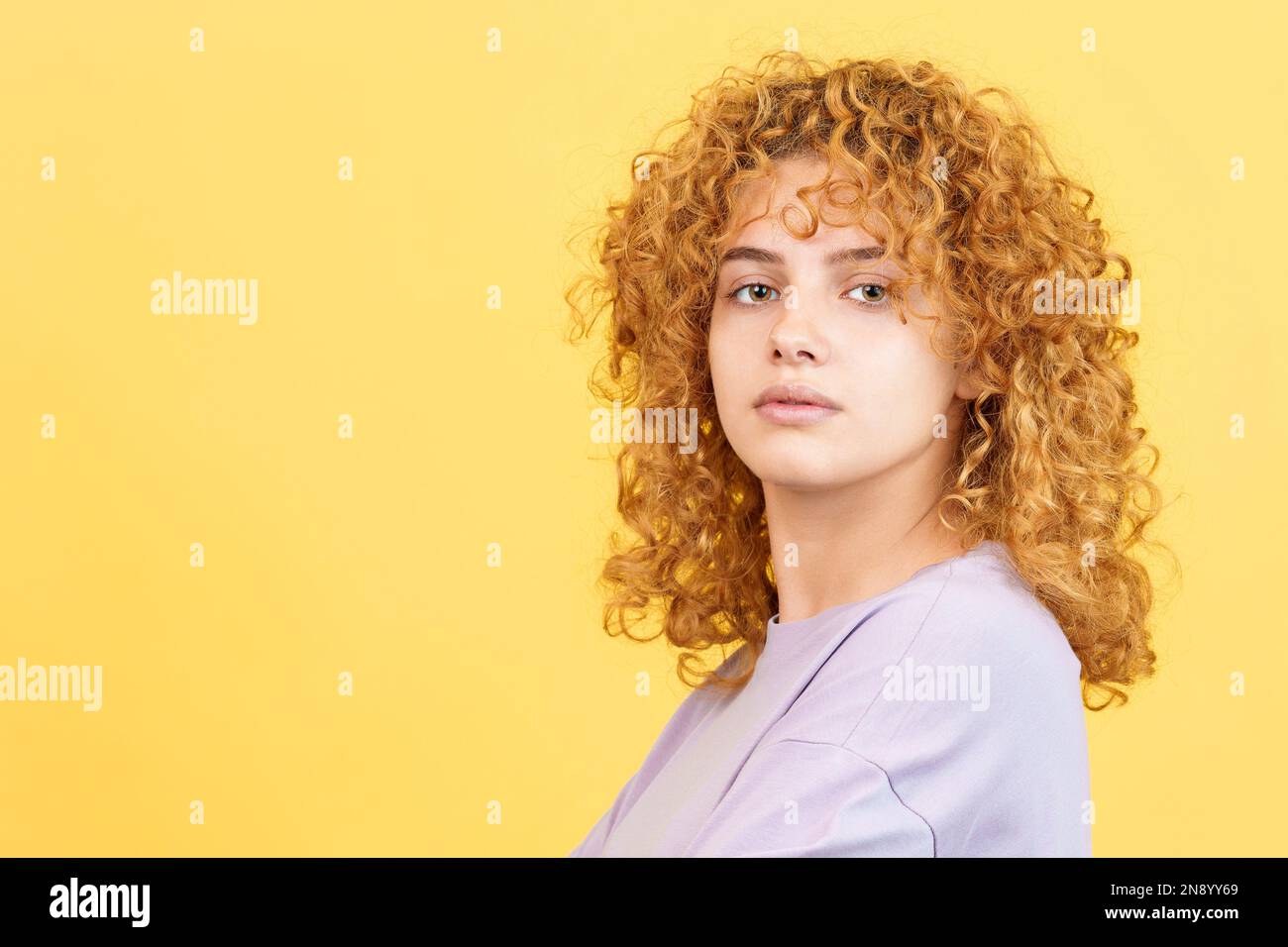 Woman turning look camera hi-res stock photography and images - Alamy