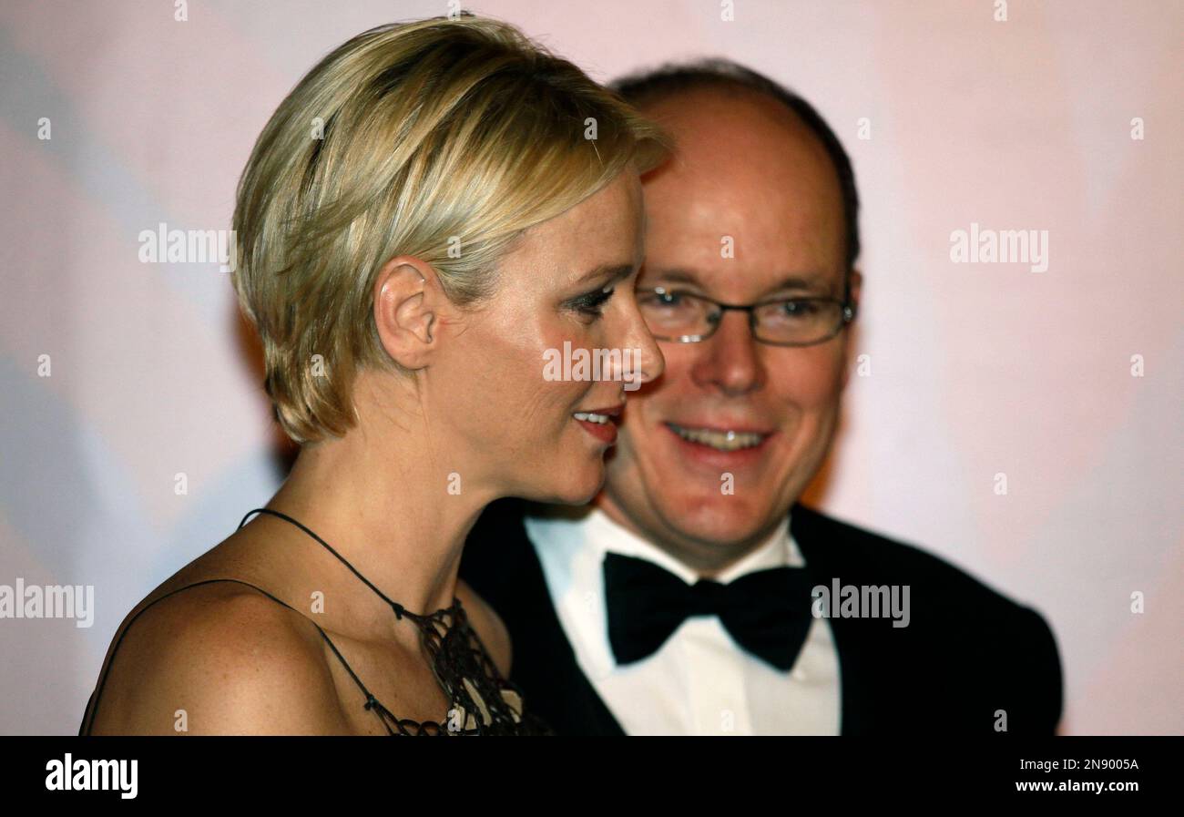Prince Albert of Monaco and his wife Princess Charlene pose during the ...