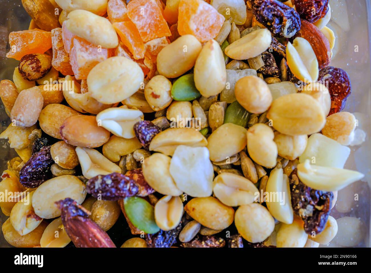 Trail mix in a container at home for hikes Stock Photo - Alamy