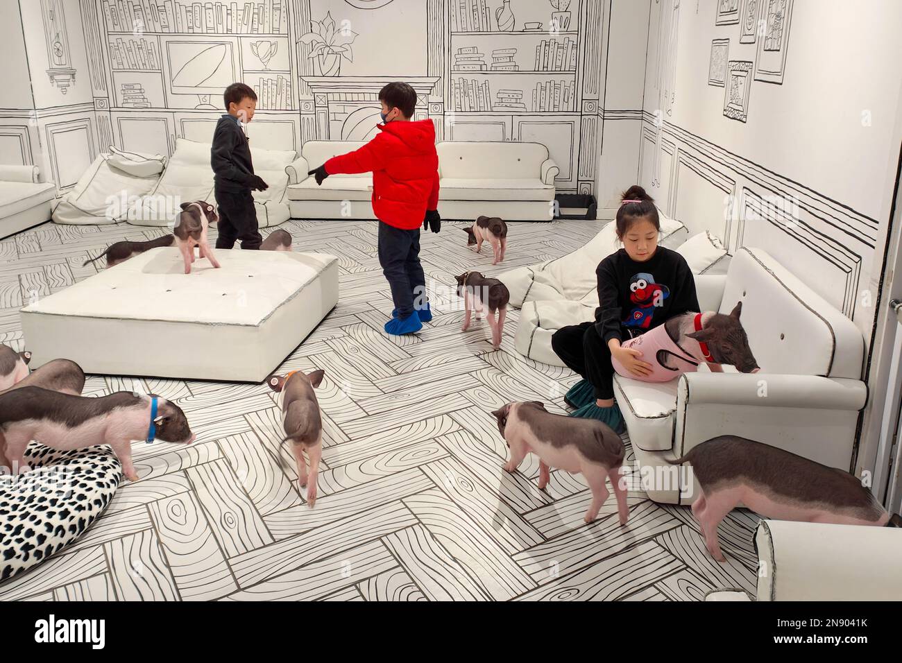 SHANGHAI, CHINA - FEBRUARY 11, 2023 - Children play with a dozen baby ...