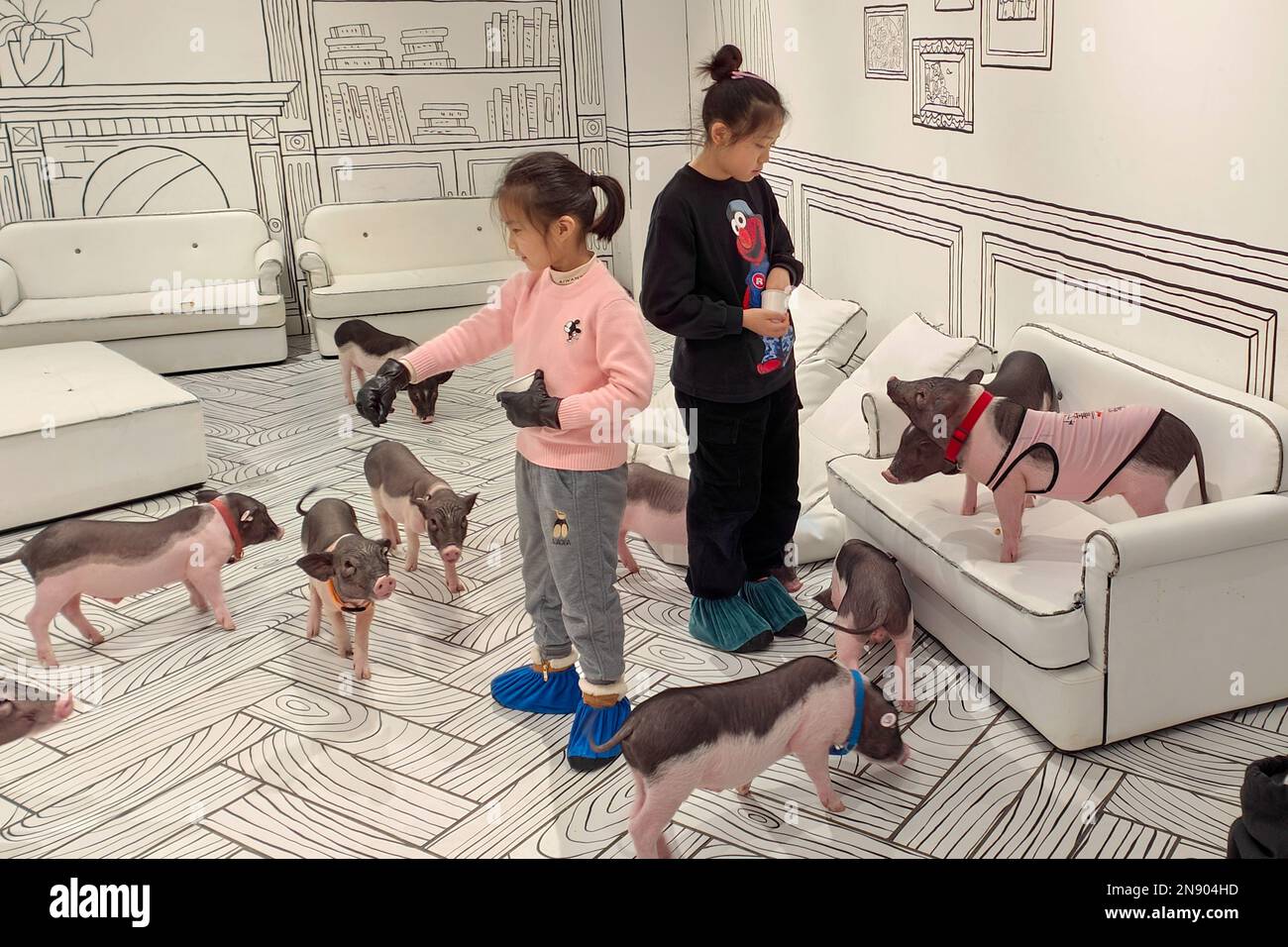 SHANGHAI, CHINA - FEBRUARY 11, 2023 - Children play with a dozen baby ...