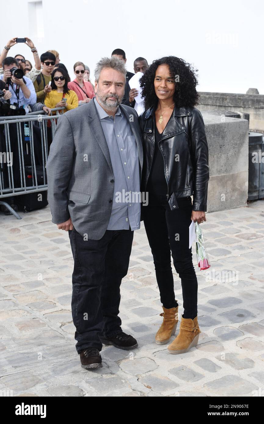 French film director Luc Besson and his wife Virginie Silla arriving at ...