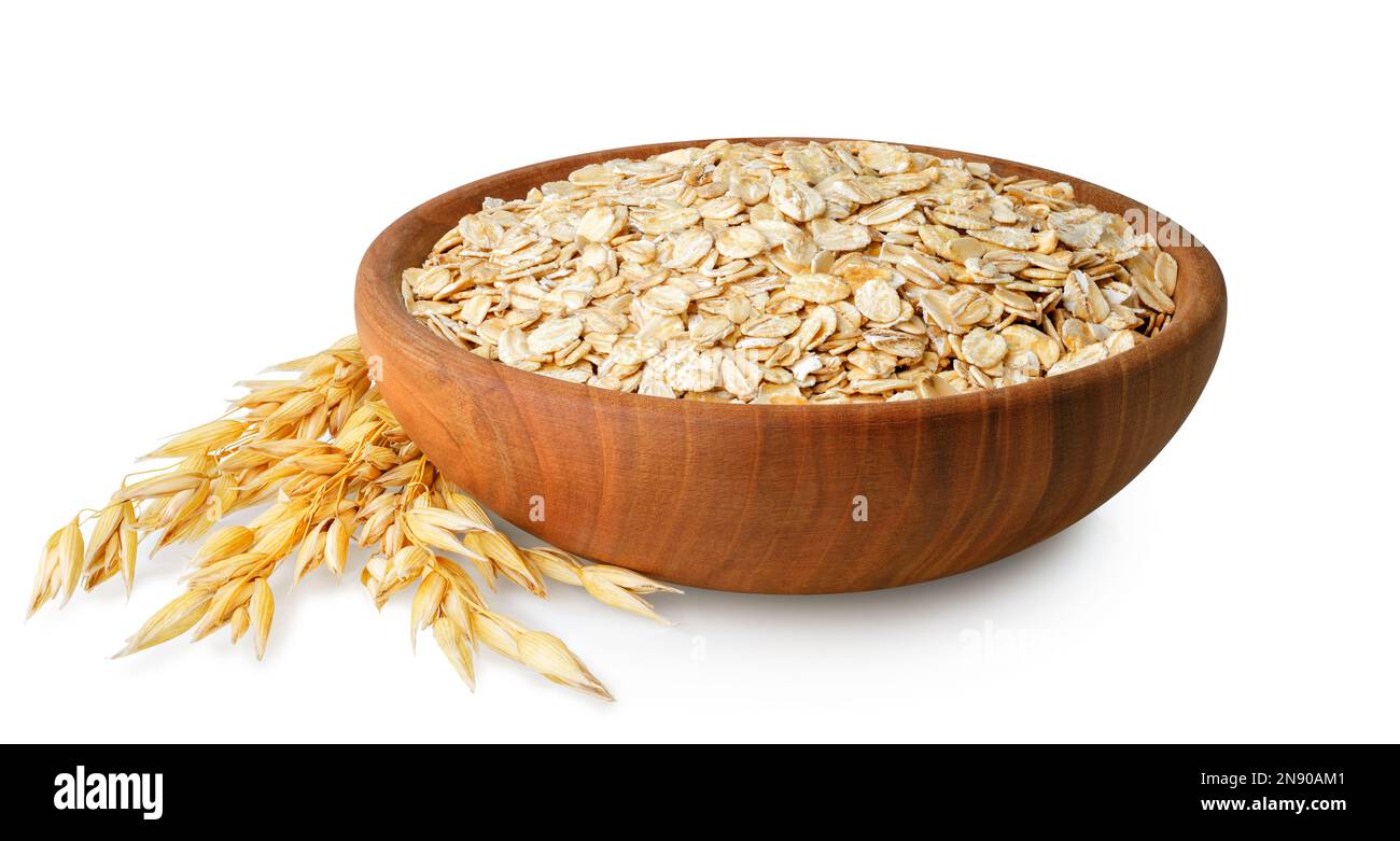 oatmeal in bowl and oat ears near isolated on white background Stock ...