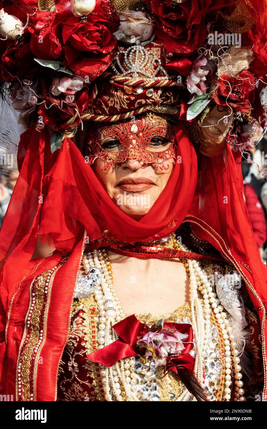11 February 2023, Venice, Italy. Revellers in colourful costumes ...