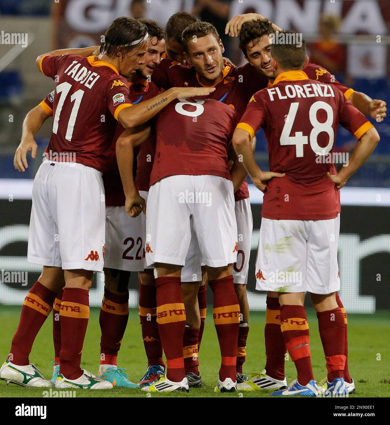 AS Roma's Francesco Totti, center, celebrates with teammates after ...