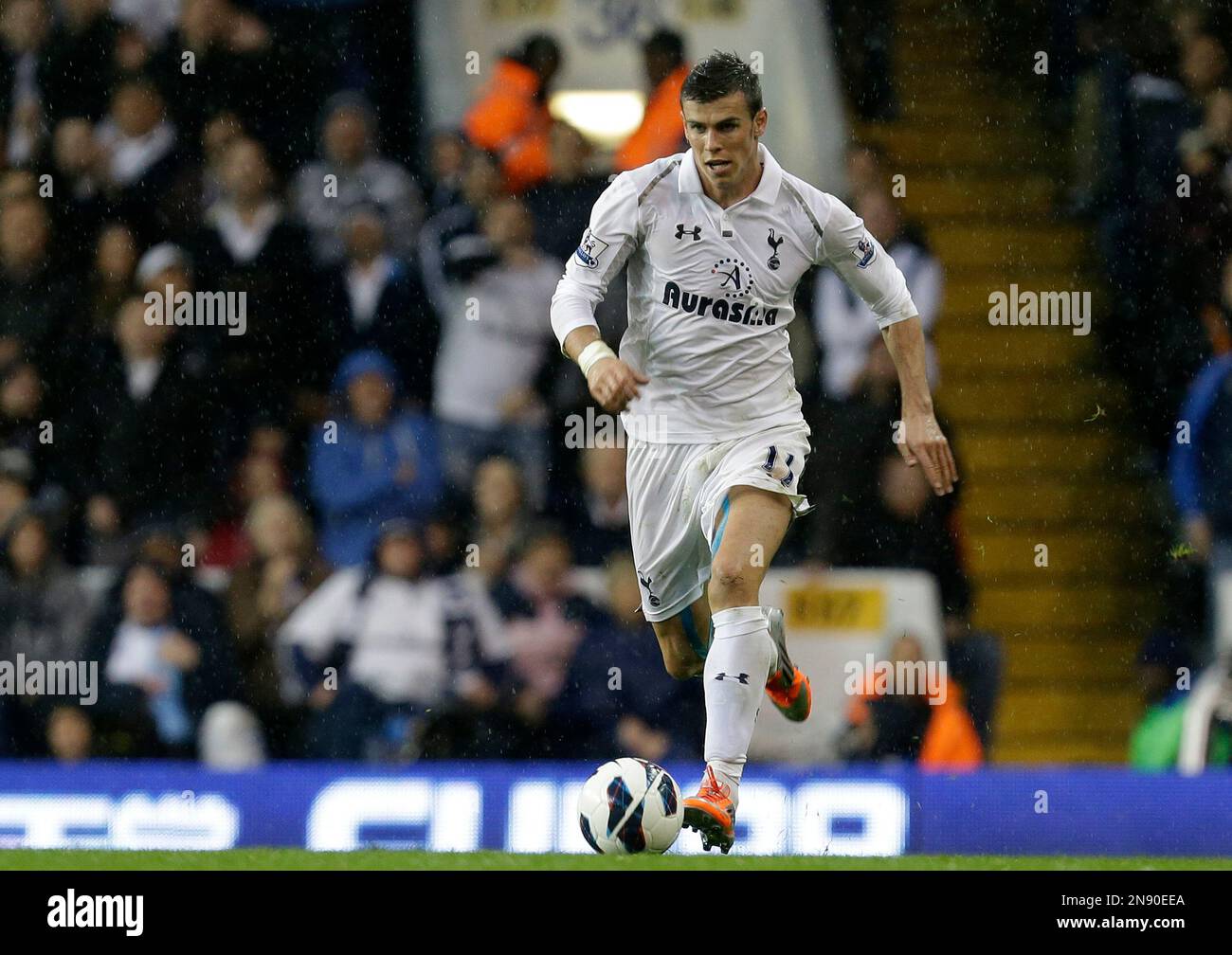 Tottenham Hotspur's Gareth Bale runs with the ball as he plays against ...