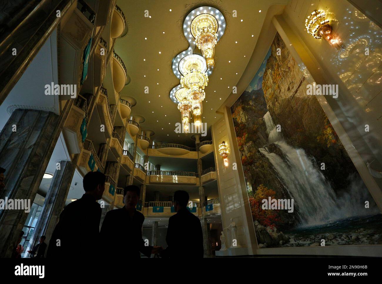 In this Sept. 20, 2012 photo, North Koreans stand at the lobby of the ...