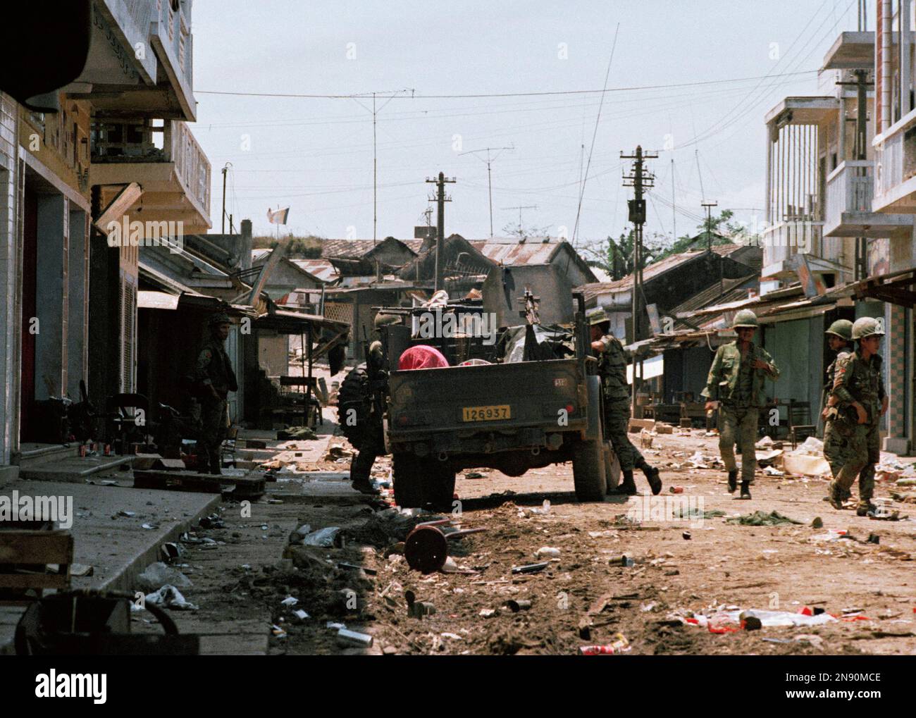 South Vietnamse soldiers patrol the ruins of a street in Dong Ha, Quang ...