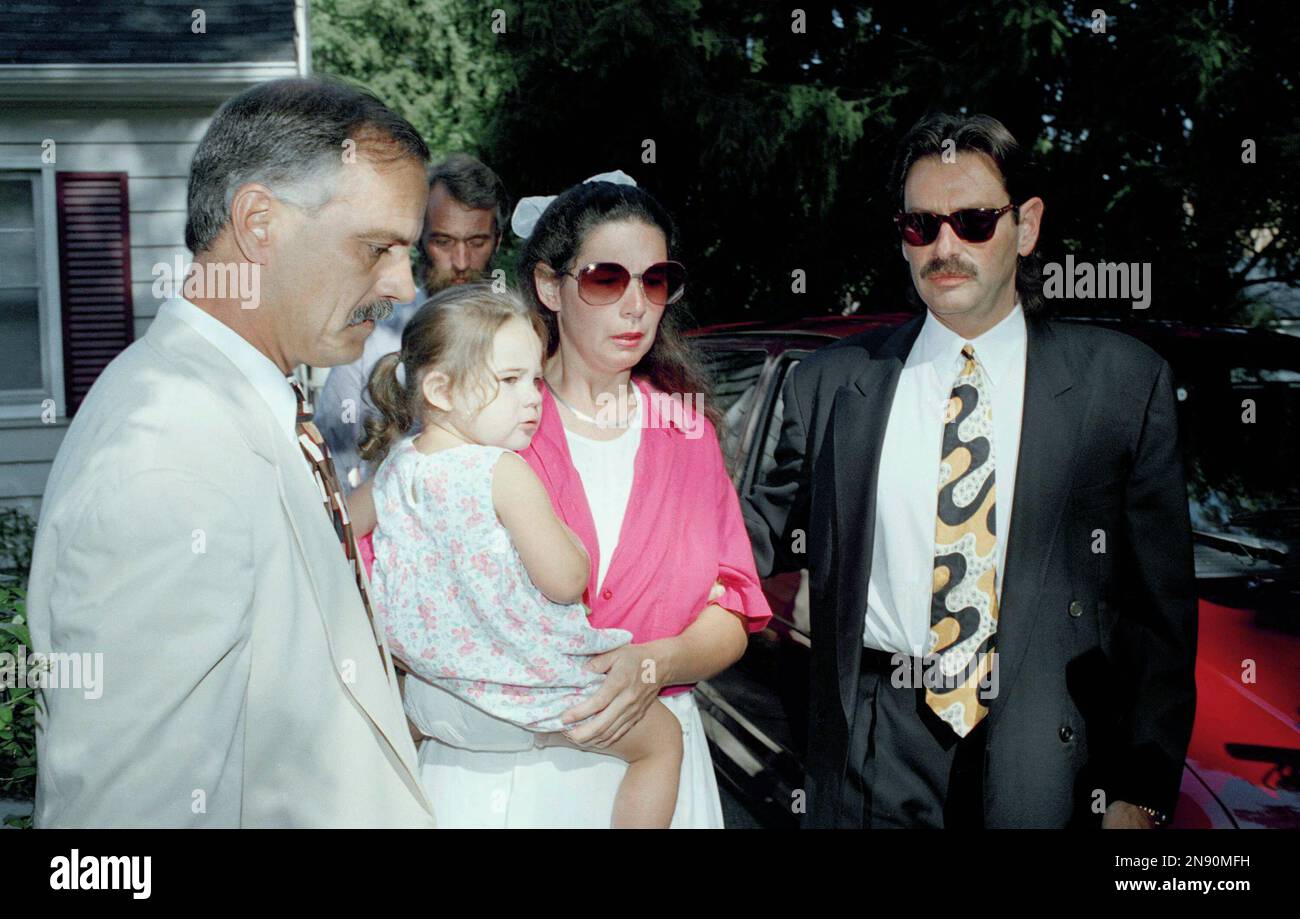 Roberta DeBoer, right, with her husband Jan, left, carries baby Jessica ...