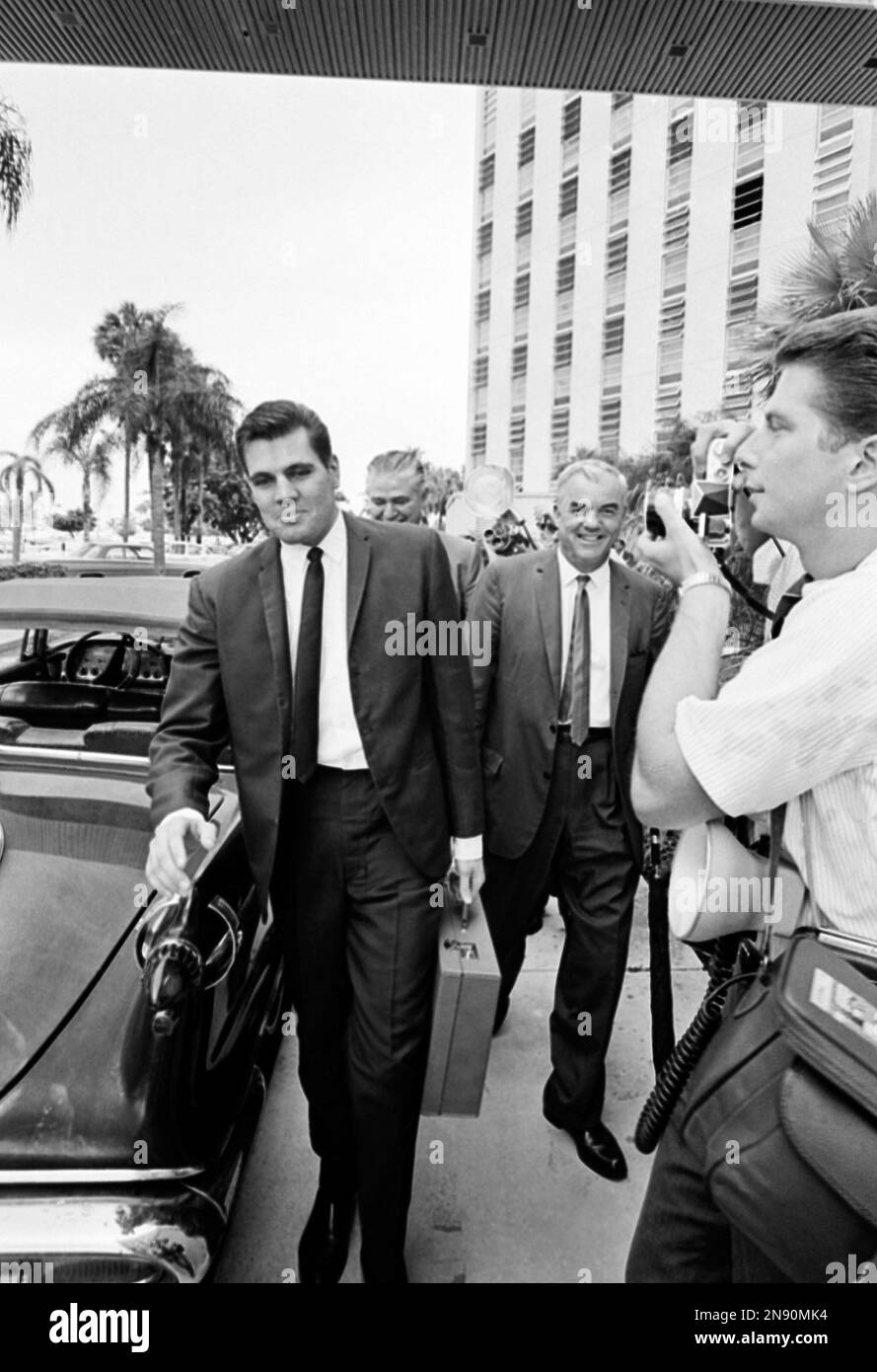 Melvin Powers, 23 smiles as he leaves county jail in Miami, Fla. August 11, 1965 free on $50,000 ...
