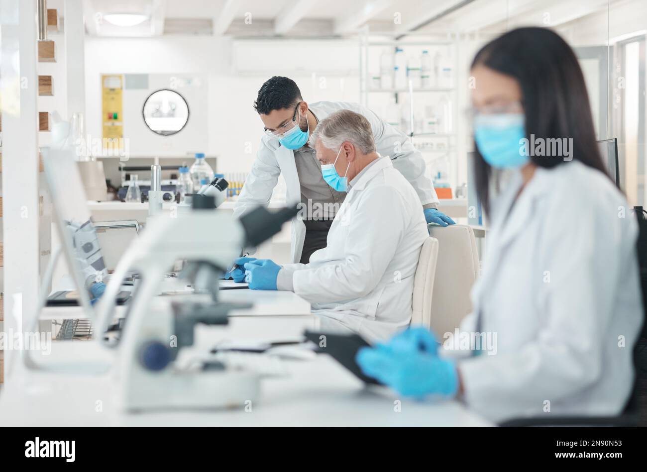 Changing the world one experiment at a time. two scientists working ...