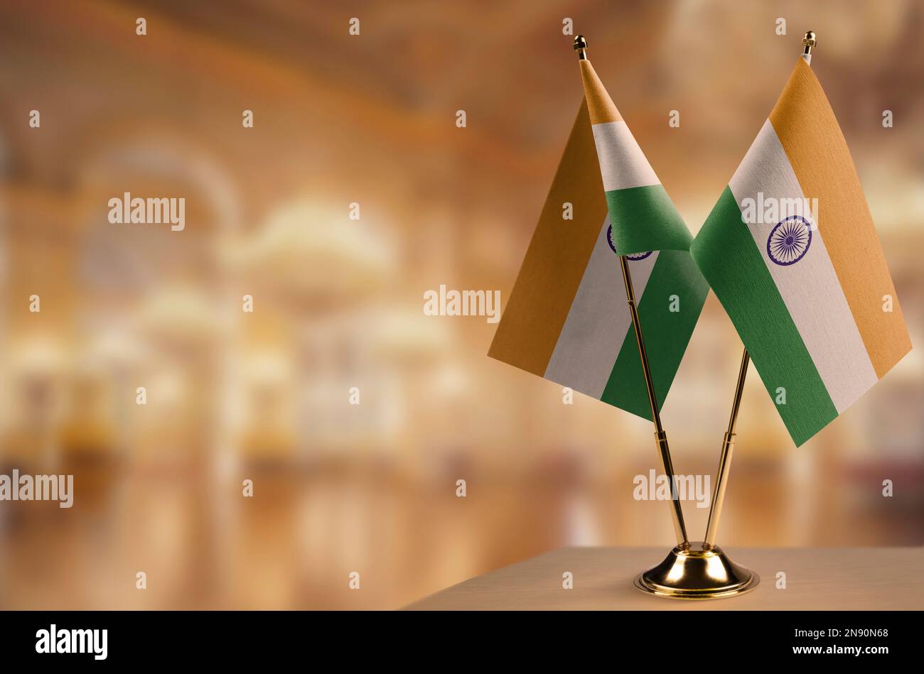 Small flags of the India on an abstract blurry background Stock Photo ...