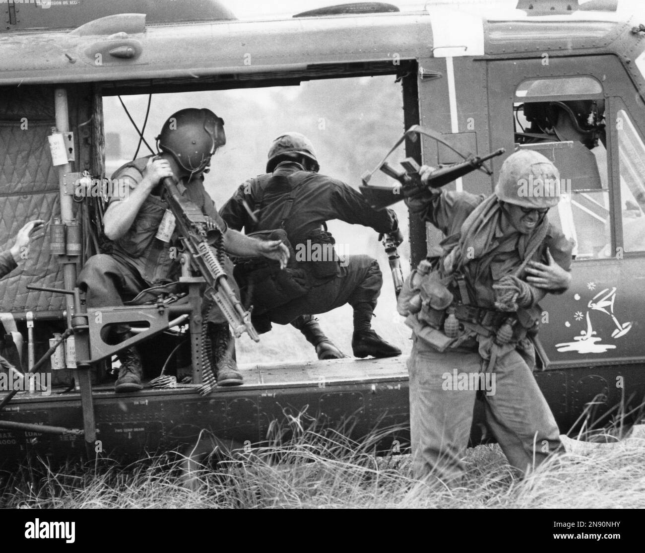 U.S. soldiers of the Big Red One, the 1st Battalion, 2nd Infantry, leap ...