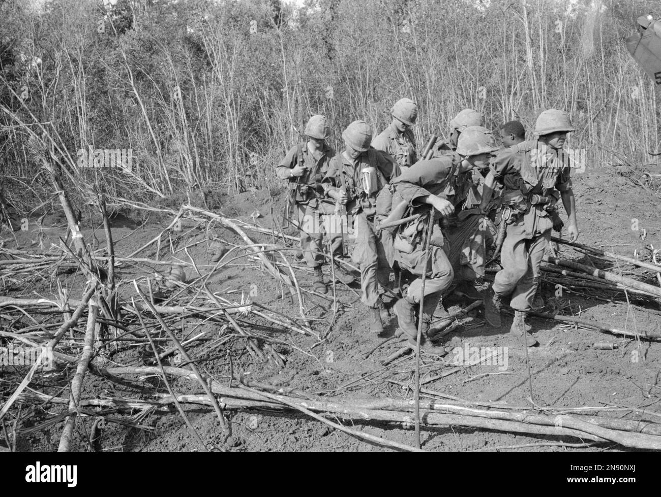 U.S. soldiers carry the body of a fellow infantryman killed near the ...