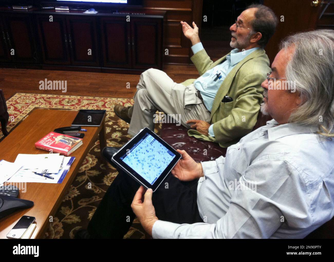 In this Monday, Sept. 24, 2012 photo, Dr. Phillip Epstein, left, and ...