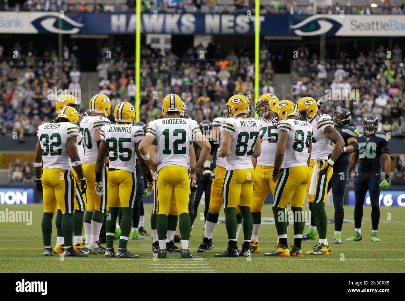 Green Bay Packers huddle in the first half of an NFL football game against the Seattle Seahawk ...