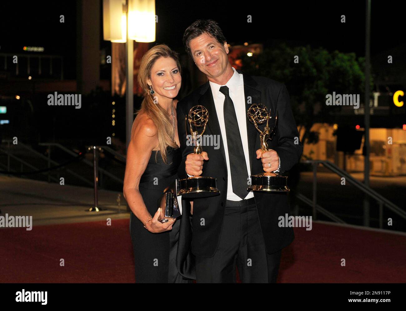 Steven Levitan, right, and Krista Levitan pose with the awards for ...