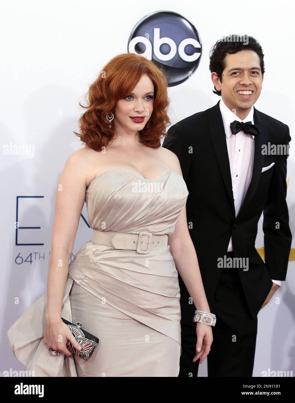 Actress Christina Hendricks and her husband Geoffrey Arend arrive at ...