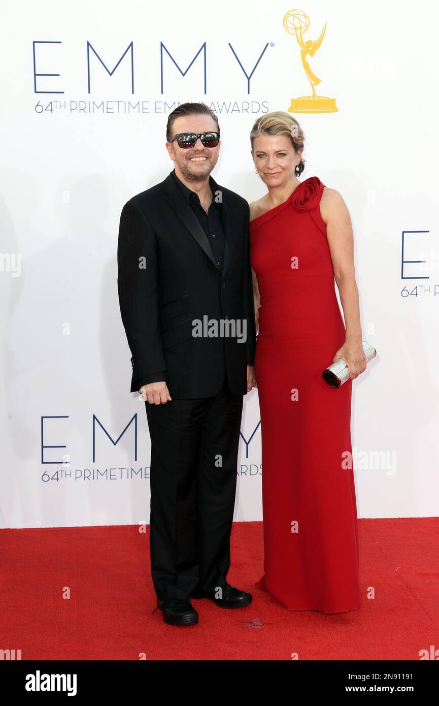 Actor Ricky Gervais, left and Jane Fallon arrives at the 64th Primetime ...