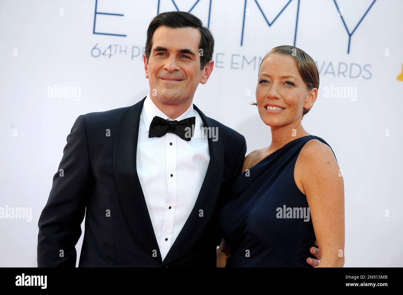 Actor Ty Burrell, left and wife Holly Burrell arrive at the 64th ...