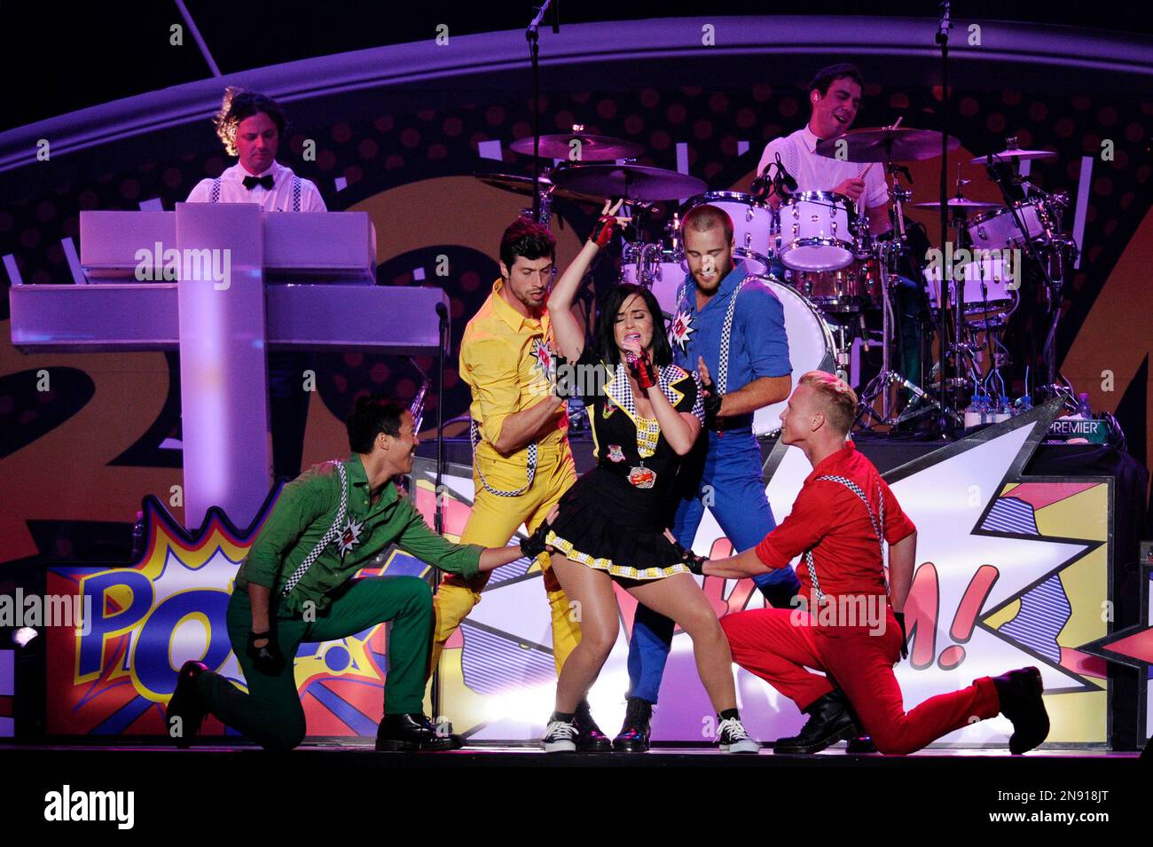 US singer Katy Perry, centre wearing black, performs during a concert ...