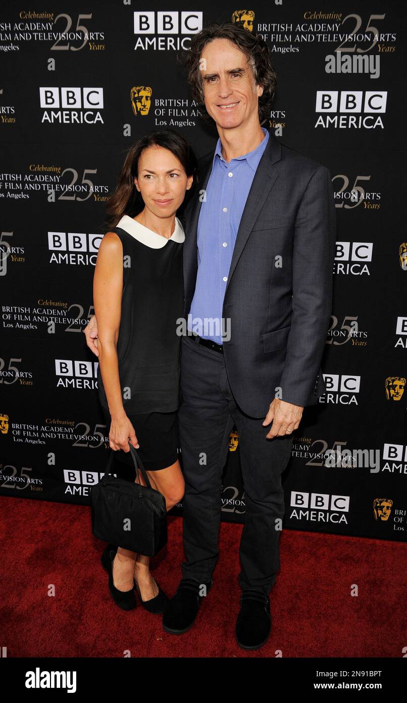 Director Jay Roach and his wife Susanna Hoffs pose together at the ...