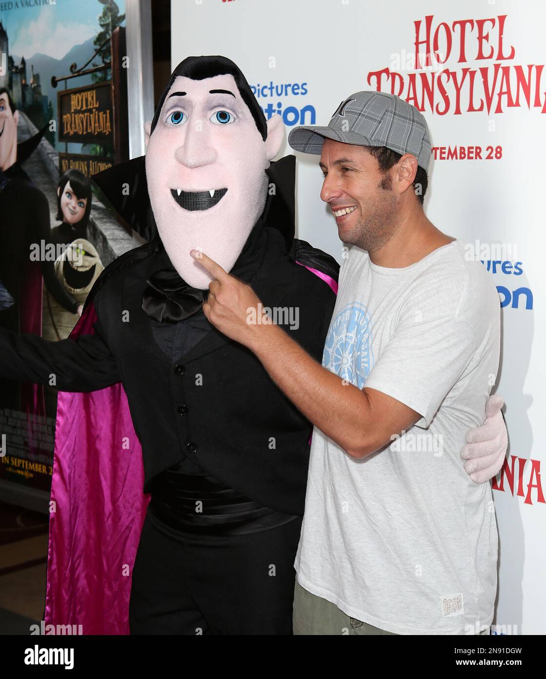 From right, Adam Sandler poses with Count Dracula during the Sony ...