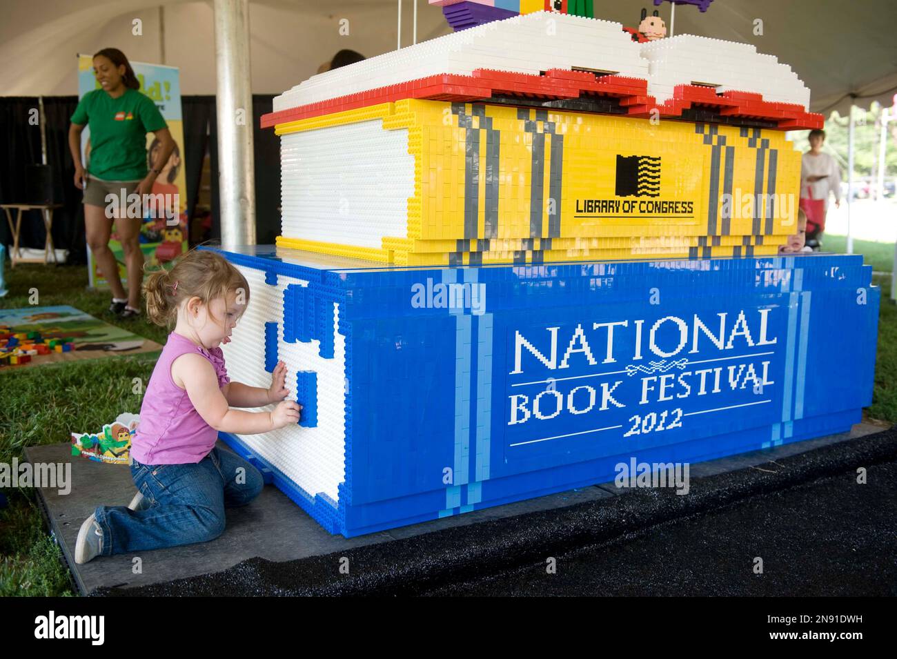 A young girl plays with LEGO DUPLO bricks at the 2012 National Book ...
