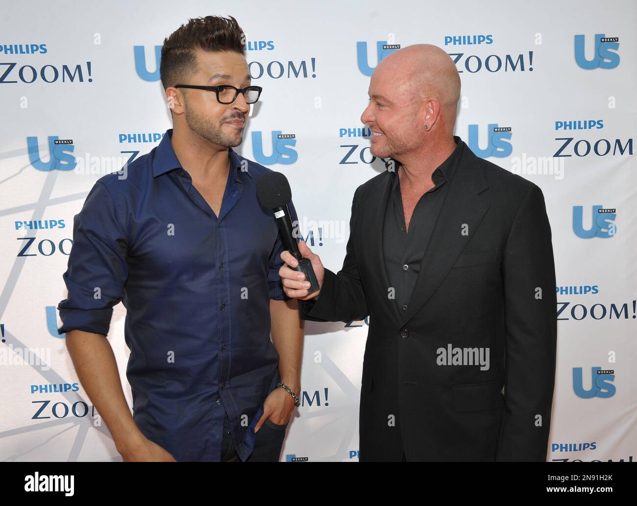 Jai Rodriguez, left and Collier Strong appear at the Philips Zoom Red ...