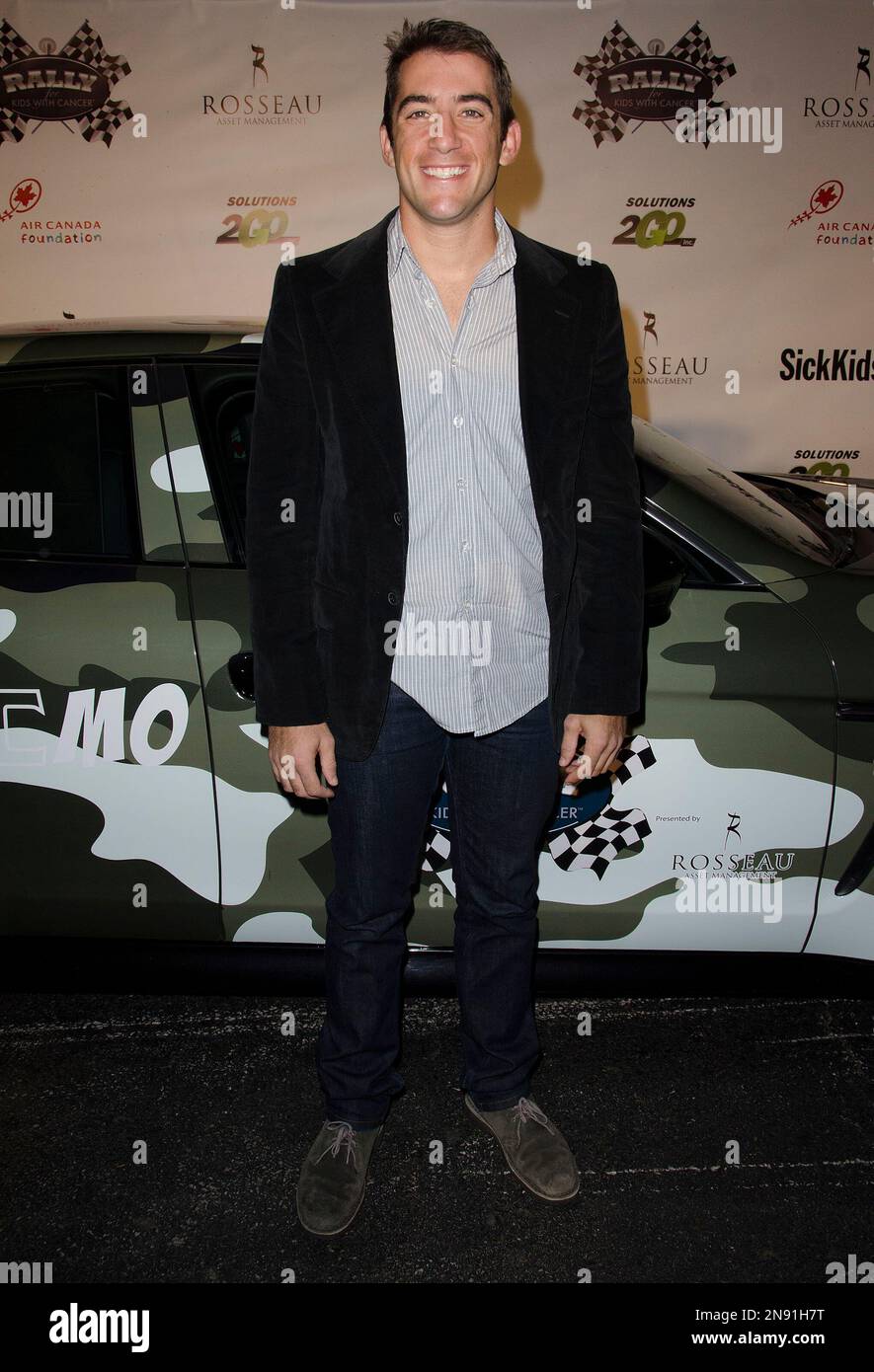 Actor Jonathan Togo arrives on the red carpet at the Fifth Annual Rally ...