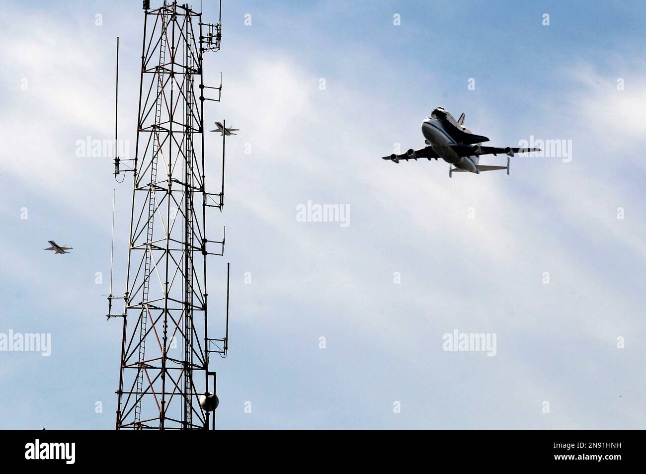 The Space Shuttle Endeavour is ferried by NASA's Shuttle Carrier ...