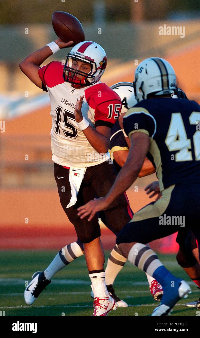 Harlingen's quarterback Brandon Garza (15) looks for a pass against ...