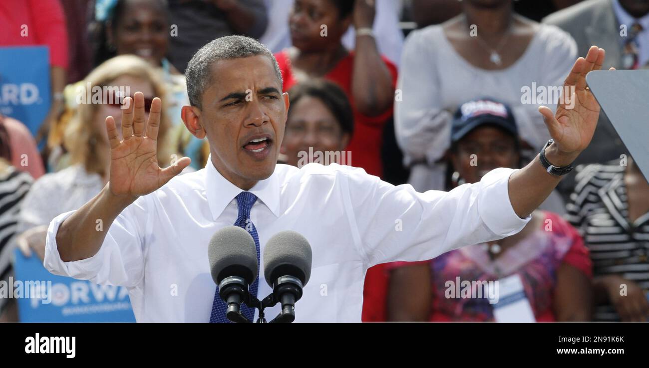 President Barack Obama gestures during a rally at the G. Richard ...