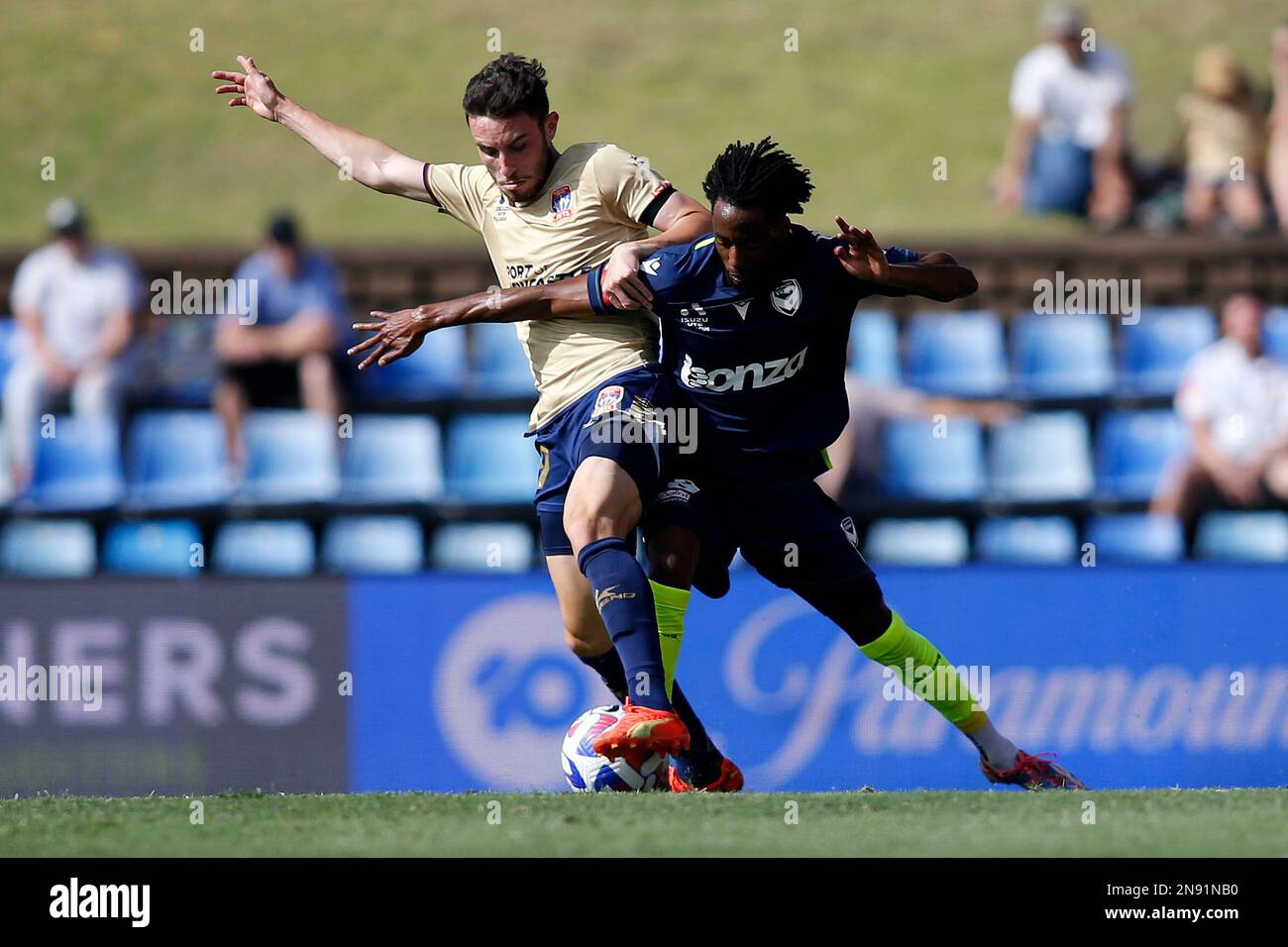 Thomas Aquilina of the Jets competes for the ball with Lleyton Brooks ...